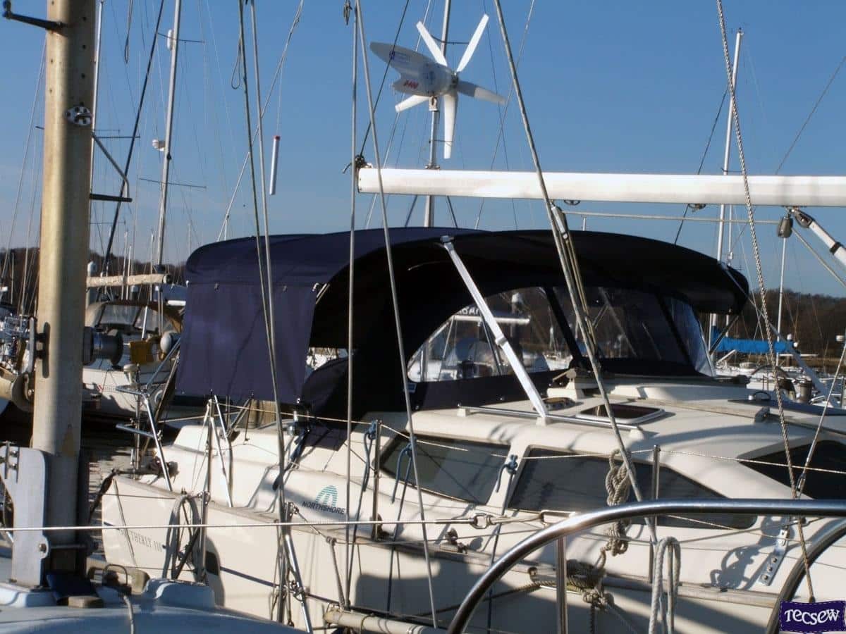 Southerly 110 Bimini, mainsheets fwd of Sprayhood - Tecsew